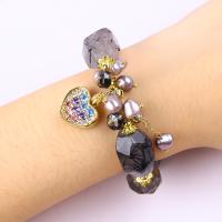 China Handmade Black Rutilated Quartz Bracelet 23cm Adjustable Natural Stone Jewelry with 106g Weight for Daily Wear for sale