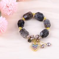 China Handmade Black Rutilated Quartz Bracelet 23cm Adjustable Natural Stone Jewelry with 106g Weight for Daily Wear for sale