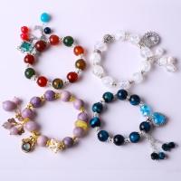 China Handmade Natural Gemstone Elastic Bracelet with 4-12mm Round Beads and Deluxe Charms - Customizable Healing Jewelry for sale