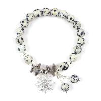 China Custom 8mm Round Dalmatian Jasper Bead Bracelet with Snowflake Charm Copper Silver Plating for sale
