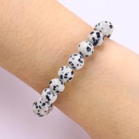 China Custom 8mm Round Dalmatian Jasper Bead Bracelet with Snowflake Charm Copper Silver Plating for sale