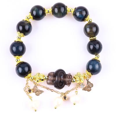 China Natural Ink Blue Tiger Eye Gemstone Beaded Bracelet 20cm Adjustable Handmade Jewelry for sale