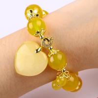 China 14mm Natural Yellow Chalcedony Yellow Jade Heart Carving Lucky Crystal Bead Bracelet Unisex for sale