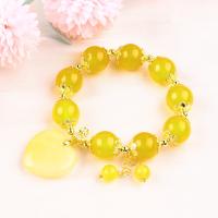 China 14mm Natural Yellow Chalcedony Yellow Jade Heart Carving Lucky Crystal Bead Bracelet Unisex for sale
