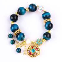China 14mm Blue Tiger Eye Healing Crystal Beaded Bracelet Copper Gold Plating Unisex Jewelry for sale