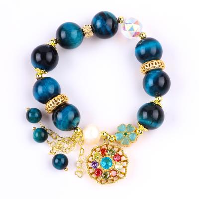 China 14mm Blue Tiger Eye Healing Crystal Beaded Bracelet Copper Gold Plating Unisex Jewelry for sale