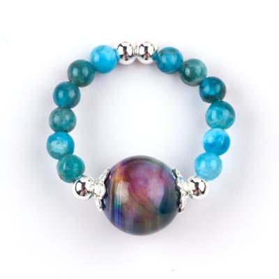 China 4mm Handmade Blue Apatite Gemstone Ring Adjustable Elastic with Tiger Eye Bead 7.6cm for sale