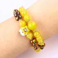 China Natural Yellow Chalcedony Crystal Bangle with Freshwater Pearl and Spongebob Charm Bracelet 8mm for sale