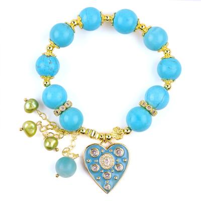 China 12mm Blue Turquoise Crystal Bracelet with Heart Charm Stretch Bead Jewelry for sale