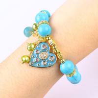 China 12mm Blue Turquoise Crystal Bracelet with Heart Charm Stretch Bead Jewelry for sale