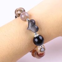 China Handmade Natural Petrified Wood Stone Beaded Bracelet 21cm Adjustable Gemstone Bracelet for Party Daily Gift for sale