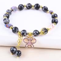 China 8mm Natural Snowflake Obsidian Bracelet with Purple Butterfly Charm Bead Unisex Stretch Jewelry for sale