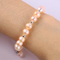 China 7mm Pink Freshwater Pearl Stretch Bracelet with Butterfly Charm - Silver Plated Unisex Jewelry Customizable for sale