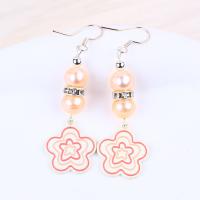 China 8mm Freshwater Pink Pearl Dangle Hook Earrings with Flower Charm - Copper Silver Plating, Unisex Jewelry for sale