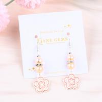 China 8mm Freshwater Pink Pearl Dangle Hook Earrings with Flower Charm - Copper Silver Plating, Unisex Jewelry for sale