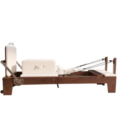 China High Quality Black Walnut pilates reformer built for Commercial GYM pilates studios Training for sale