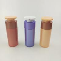 China Purple Plastic Cosmetic Dispenser Bottle with White Push Down Press Pump for sale