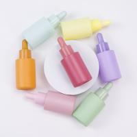 China 30ml Macaron Color Essential Oil Bottle with Plastic PP Pump and UV-Protective Glass for sale