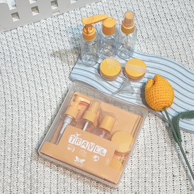 China 7pcs Travel Size Toiletries Set PET Plastic Spray Bottles with Screw Cap 100ml for sale