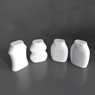 China HDPE 40ml 60ml Food Grade Squeeze Bottle with Flip Top Cap for Lotion for sale
