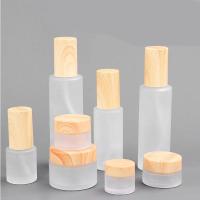 China 5g 10g 15g 30g 50g Empty Frosted Glass Cream Jars Cosmetic Natural Wood Leakproof Containers for Eye Cream Face Mask Skincare for sale