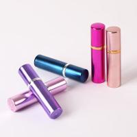 China Luxury Pink Aluminum Portable Perfume Spray Bottle with Metallic Ring for sale