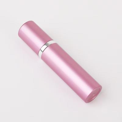 China Luxury Pink Aluminum Portable Perfume Spray Bottle with Metallic Ring for sale