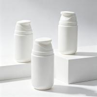 China 50ml 100ml Round Bottom Airless Bottle Frosted White Plastic Press Airless Pump Bottle with Clear Cap for sale