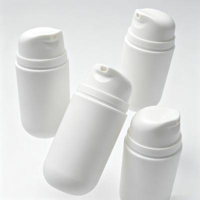 China 50ml 100ml Round Bottom Airless Bottle Frosted White Plastic Press Airless Pump Bottle with Clear Cap for sale