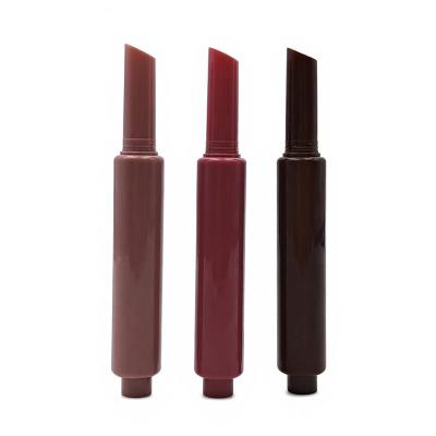 China 2.4g Press Lipstick Tube Empty Push up Plastic Lip Balm Container Glossy Color Cosmetic Lipstick Packaging Tube for sale