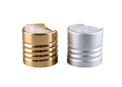 China Ribbed Aluminum Cosmetic Bottle Caps 20/410 24/410 in Gold and Silver with BPA-Free PP Interior for sale