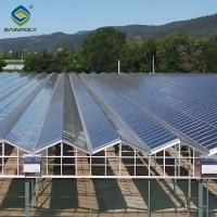 China Solar Panel Tempered Glass Greenhouse Multi Span Energy Efficient for sale
