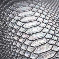 China Hot Sale Premium 0.9mm Stretch 3D Embossed Foil Printed Pearlescent Supple PU Synthetic Leather for Handbags & Luggage for sale