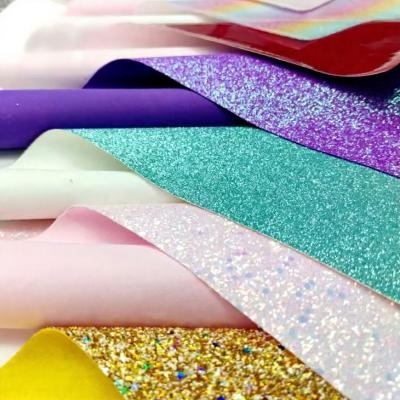 China Premium Sparkly Chunky Glitter Faux Leather Sheets Shiny Synthetic Vinyl PU Fabric for Shoes Bags Bows Crafts for sale