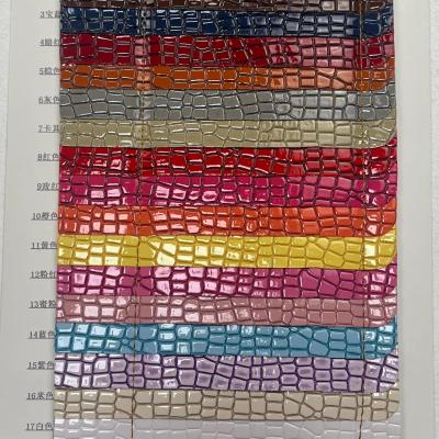 China Vibrant Croc Embossed Eco-Friendly PU Artificial Leather Fabric Sheets Assorted Colors for Bags Sofas Garments for sale