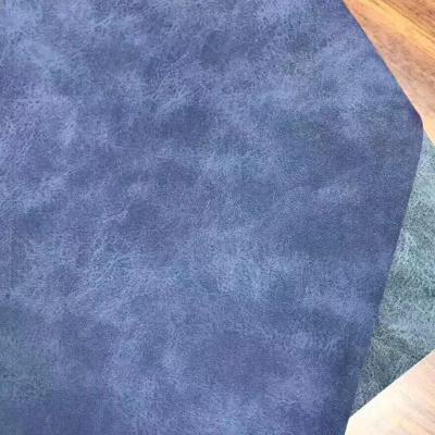 China Eco Friendly Blue Hot PU Thermo Leather for Notebook Cover Book Binding for sale