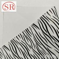 China 0.9 mm Zebra Pattern Emboss Litchi Texture Rexine PU PVC Faux Artificial Synthetic Leather Fabric for Bags Handbags Shoes for sale