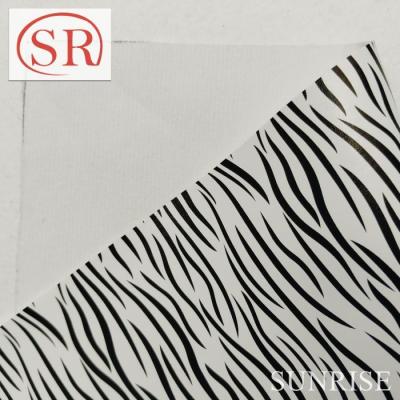 China 0.9 mm Zebra Pattern Emboss Litchi Texture Rexine PU PVC Faux Artificial Synthetic Leather Fabric for Bags Handbags Shoes for sale