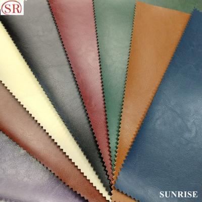 China Eco-Friendly PU Leather Smooth Litchi Patterned Wear-Resistant Waterproof for Sofa Cushion Bags Shoes Garments Decoration for sale