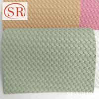 China Innovative Knit Design Faux Leather Fabric Fashion Three-dimensional Embossing PU Leather for Handbags for sale