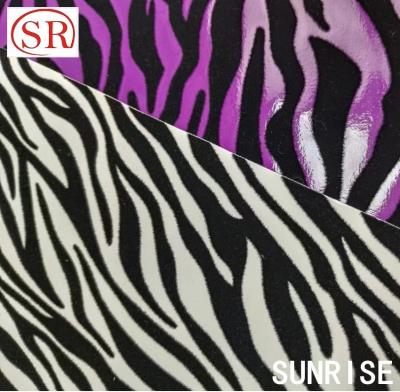 China Animal Skin Imitation Leopard Print Embossed PU and PVC Leather with Printed Film for sale
