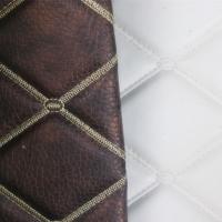 China Abrasion-Resistant Hole Pattern Embroidered Pattern Car Upholstery Fabric PU Leather Fabric for sale