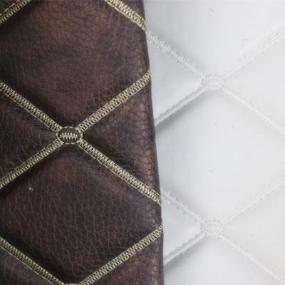 China Abrasion-Resistant Hole Pattern Embroidered Pattern Car Upholstery Fabric PU Leather Fabric for sale