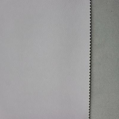 China Hot Selling High Tearing Strength PU Microfiber Faux Suede Embossed Synthetic Leather Fabric Waterproof for Garments Football for sale
