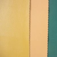 China Waterproof PU Faux Artificial Synthetic Garment Leather Roll Fabric for Jacket Pants for sale