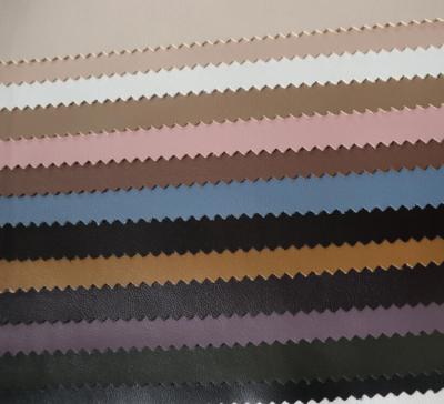China Synthetic Faux PU PVC Clothing Covers Garment Bag Protein Metal Wire Cloison Tinsel Leather Fabric for sale