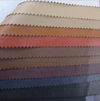 China Synthetic Faux PU PVC Clothing Covers Garment Bag Protein Metal Wire Cloison Tinsel Leather Fabric for sale