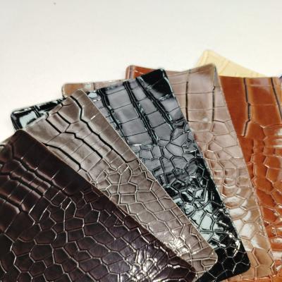 China Many Colors Snake Skin Sparkle Vinyl PVC Faux Leather Fabric Knitted Bag Box  Case Leather for sale
