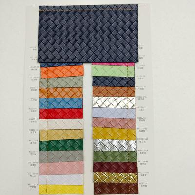 China Designer Customizes Granular logo PU Printed Embossed Synthetic Leather Fabric for Handbags Notebook Phone Faux Leather Fabric for sale