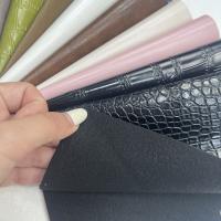 China Hot Sale Stock PVC  Leather Very Cheap Price 0.6mm Nappa Pattern Pvc Leather Furniture Leather for sale